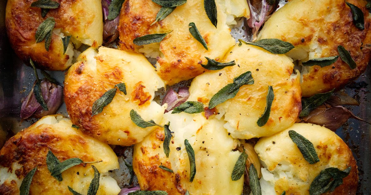 Delicious Golden Roast Potatoes with Sage and Garlic Recipe